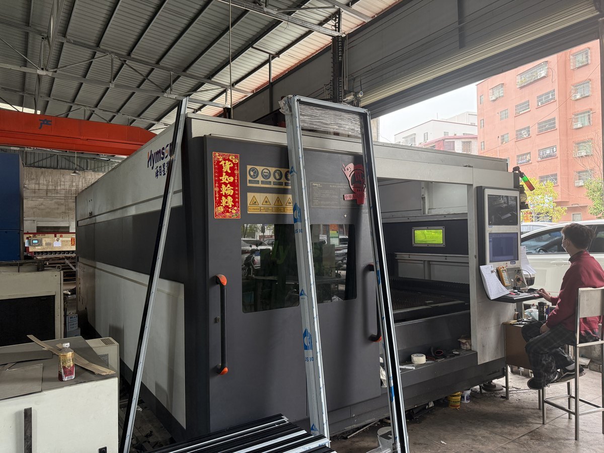 Fiber laser cutting machine in our stainless steel fabrication workshop